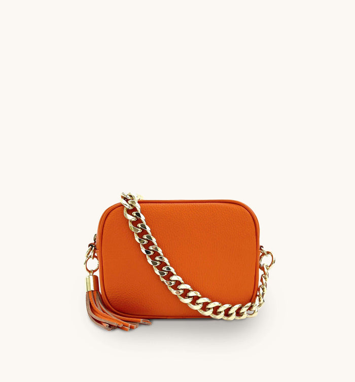 The Tassel Orange Leather Crossbody Bag With Gold Chain Strap